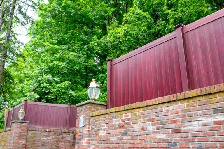 Retaining Wall Fence 101: Types, Project Tips, & Design Ideas